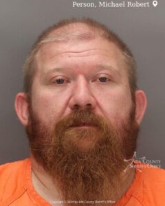 Michael Person booked for Strangulation (Attempted) | I18-923