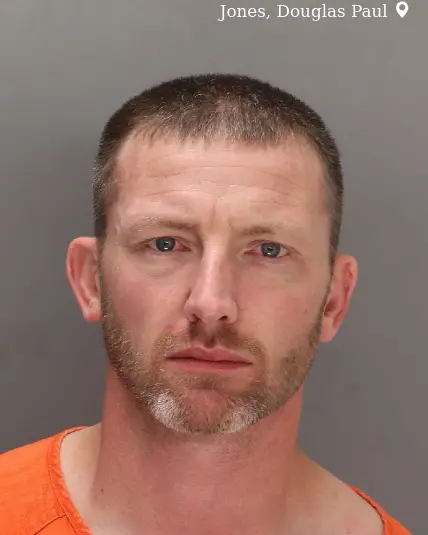 Douglas Jones booked for Battery | I18-903_M