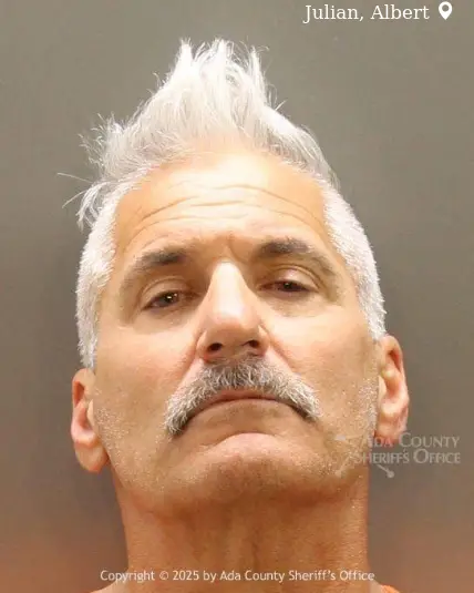 Albert Julian booked for Assault-Aggravated | I18-905